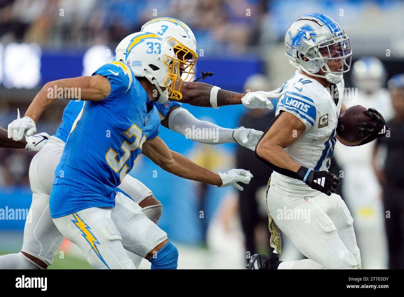 Detroit Lions wide receiver Amon-Ra St. Brown (14) runs after a catch ...