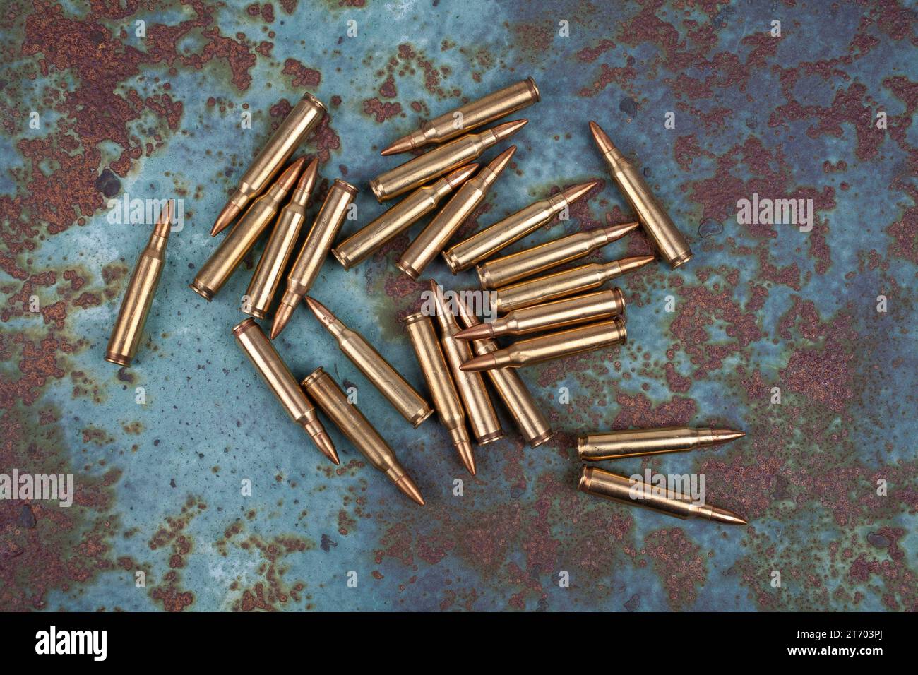 Ammunition on rust metal background Stock Photo - Alamy