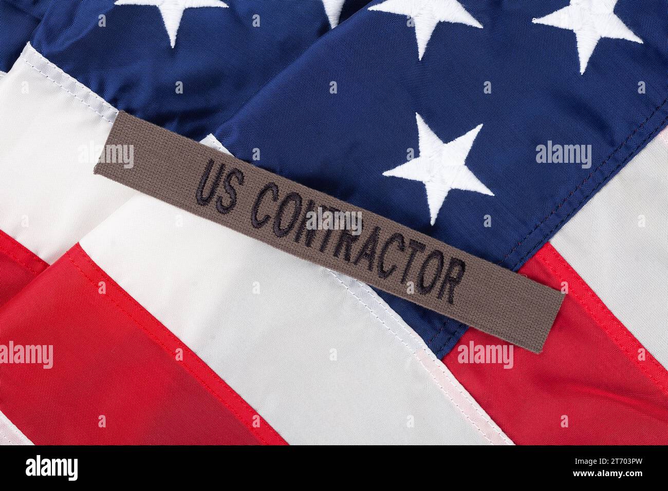 US Contractor Branch Tape on national USA flag background Stock Photo ...
