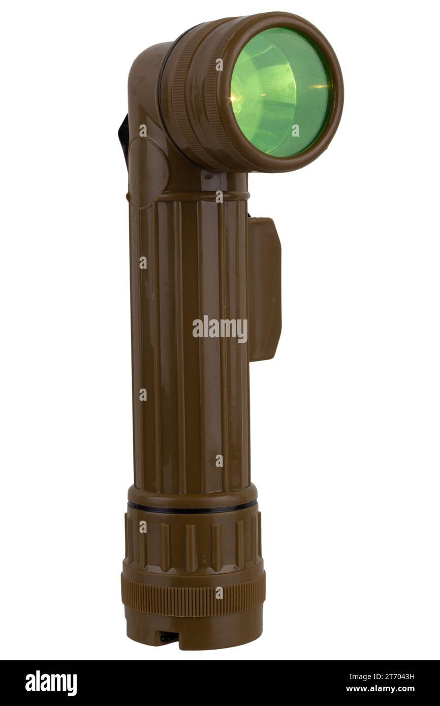 vintage military style flashlight with green light isolated on white ...
