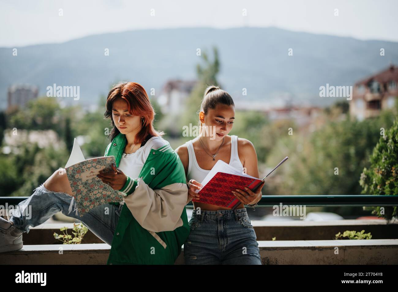 Urban Students Collaborating on School Project Outdoors Stock Photo - Alamy