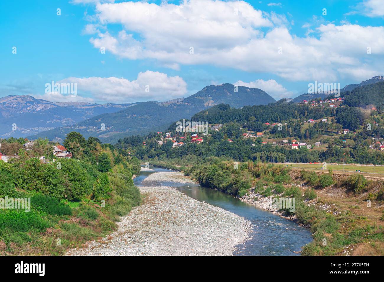 Moraca River gracefully winds its way through a serene Podgorica suburb ...