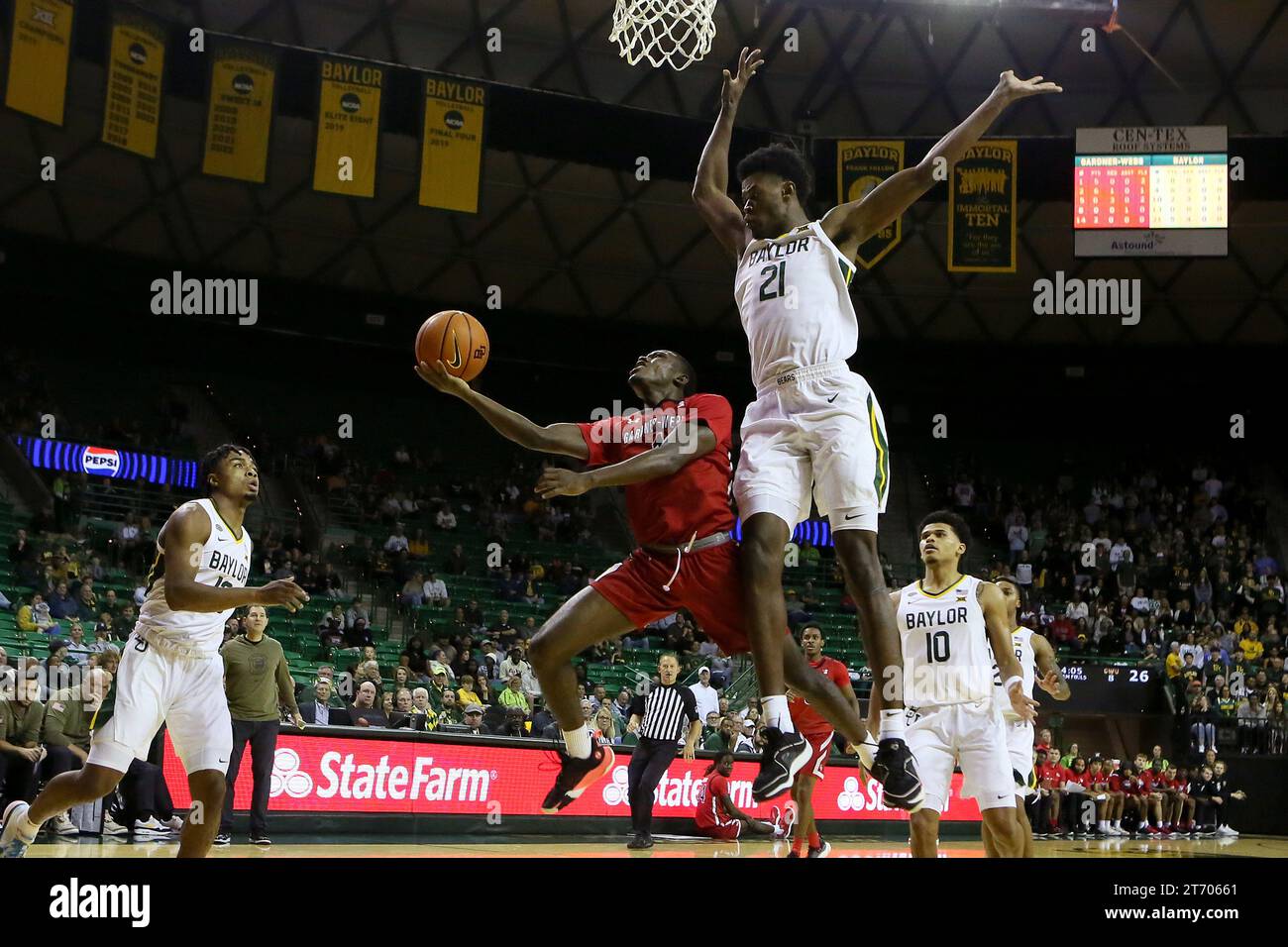 Gardner-Webb guard Julien Soumaoro, center left, is fouled by Baylor ...
