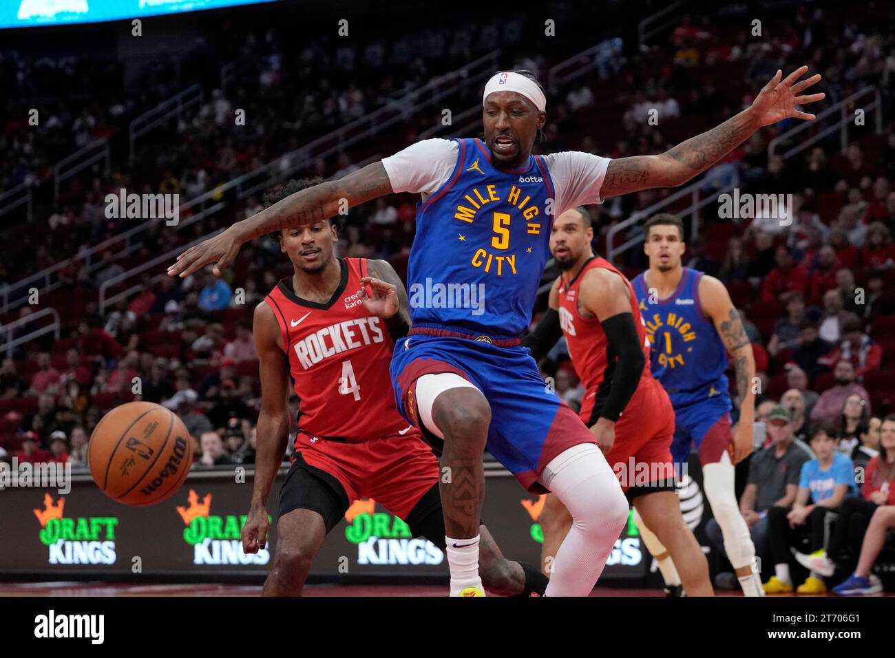 Denver Nuggets' Kentavious Caldwell-Pope (5) loses the ball as Houston ...