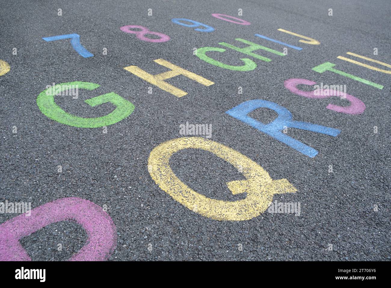 the alphabet and numbers are drawn with color paint on a children's ...