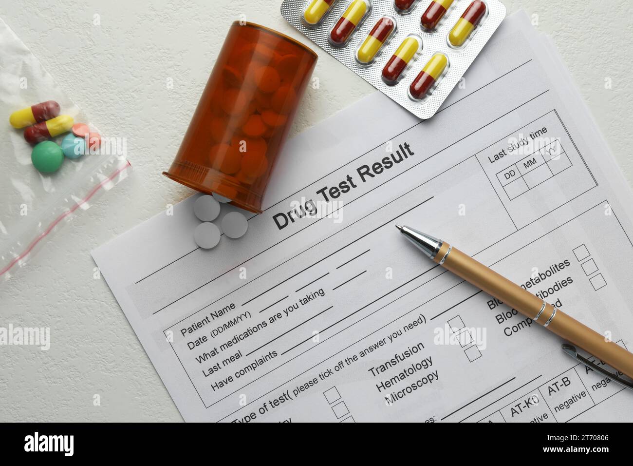 Drug test result form, pills and pen on light table, flat lay Stock ...
