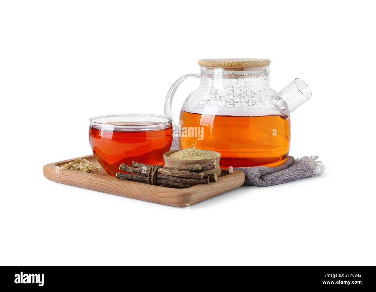 Aromatic licorice tea, dried sticks of licorice root and powder on ...