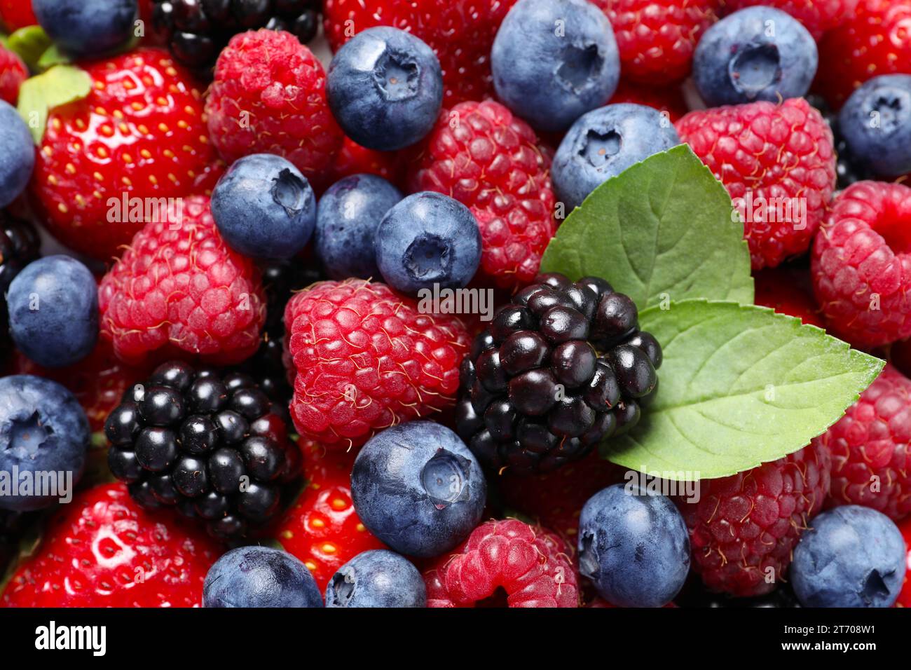 Different fresh ripe berries as background, closeup view Stock Photo ...