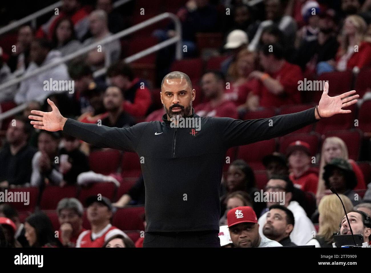 Houston Rockets coach Ime Udoka questions a foul call during the first ...