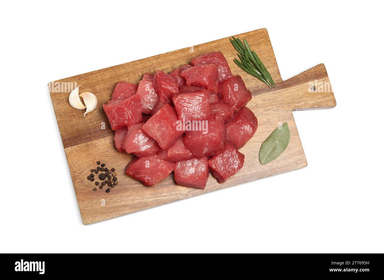 Pieces of raw beef, bay leaves, garlic, rosemary and peppercorns ...