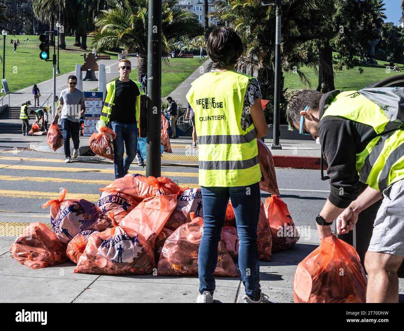 Volunteers clean up the city near Dolores Park in San Francisco on ...