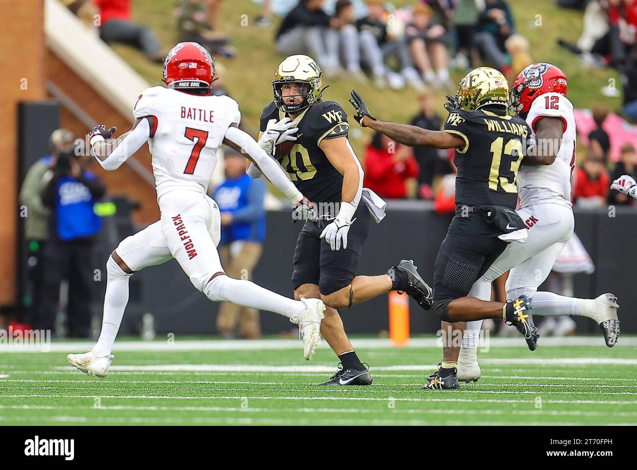 November 11,2023: Wake Forest junior Cameron Hite (20) runs the ball ...