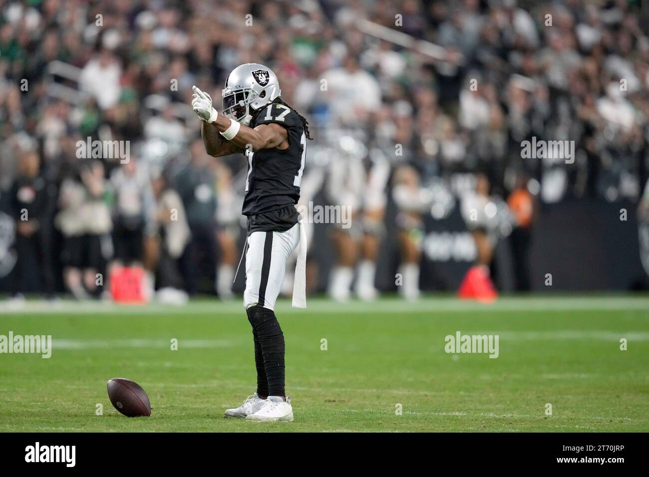 Las Vegas Raiders wide receiver Davante Adams celebrates after making a ...