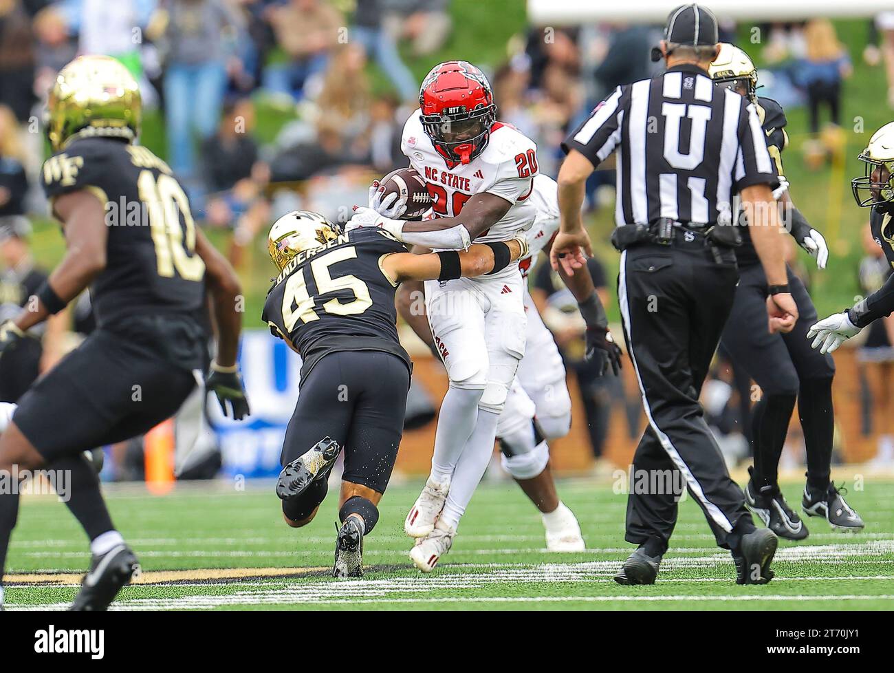 November 11,2023: Wake Forest sophomore Dylan Hazen (24) brings down NC ...
