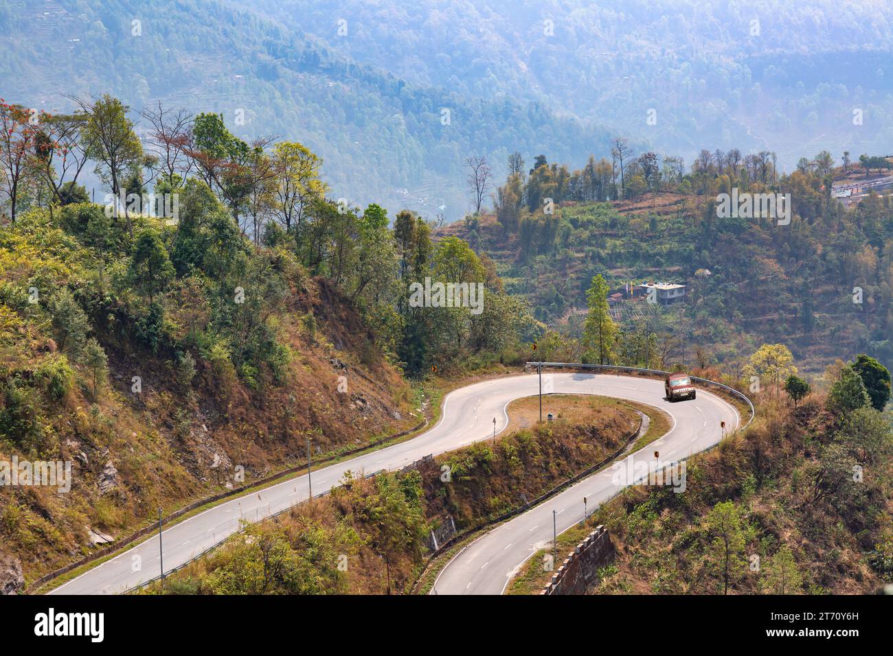 Aerial view of a mountain road with scenic Himalayan landscape at ...