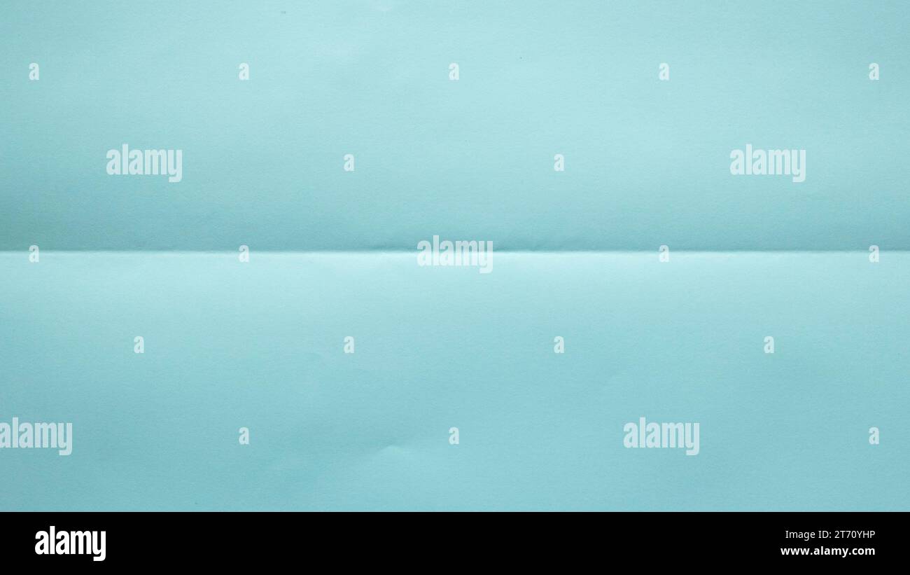 Folded blue paper hi-res stock photography and images - Alamy