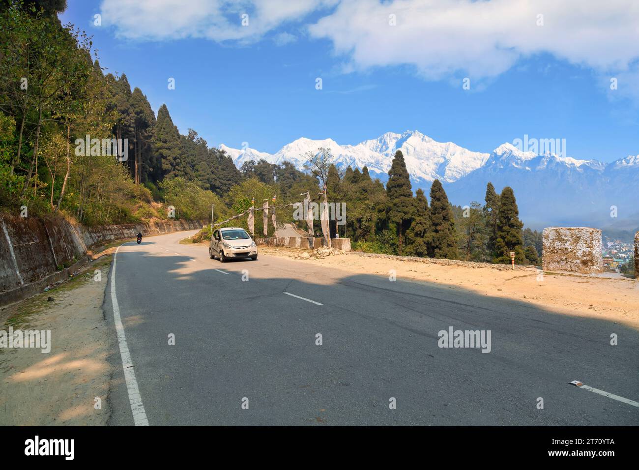 Scenic mountain road near Lava Kalimpong, India, with the Kachenjunga ...