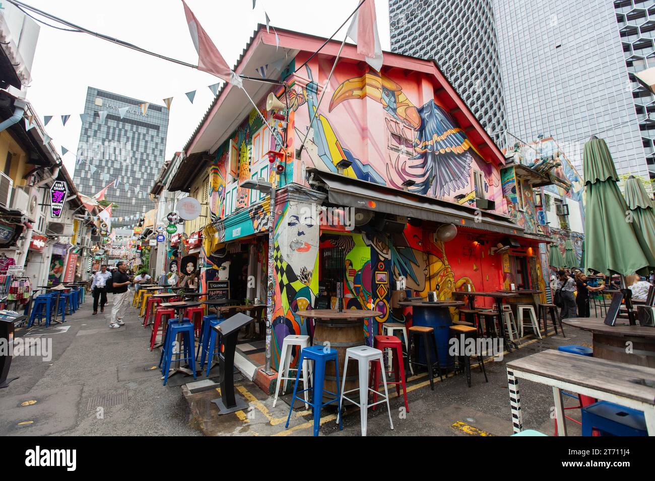 Haji Lane is adorned with colourful and creative street art, including ...