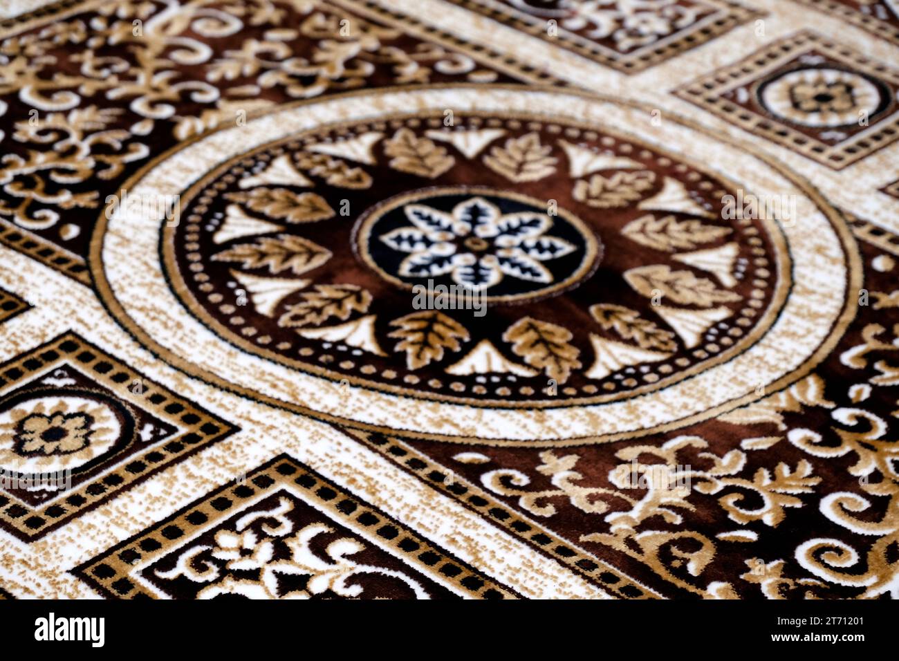 Carpet being rolled and displayed at a carpet exhibition in pune ...