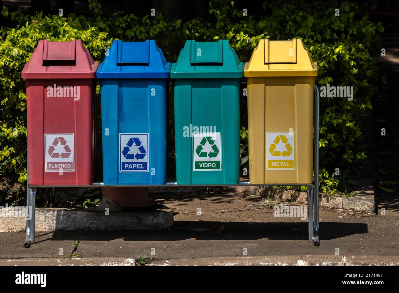 Yellow trash in garbage cans hi-res stock photography and images - Alamy