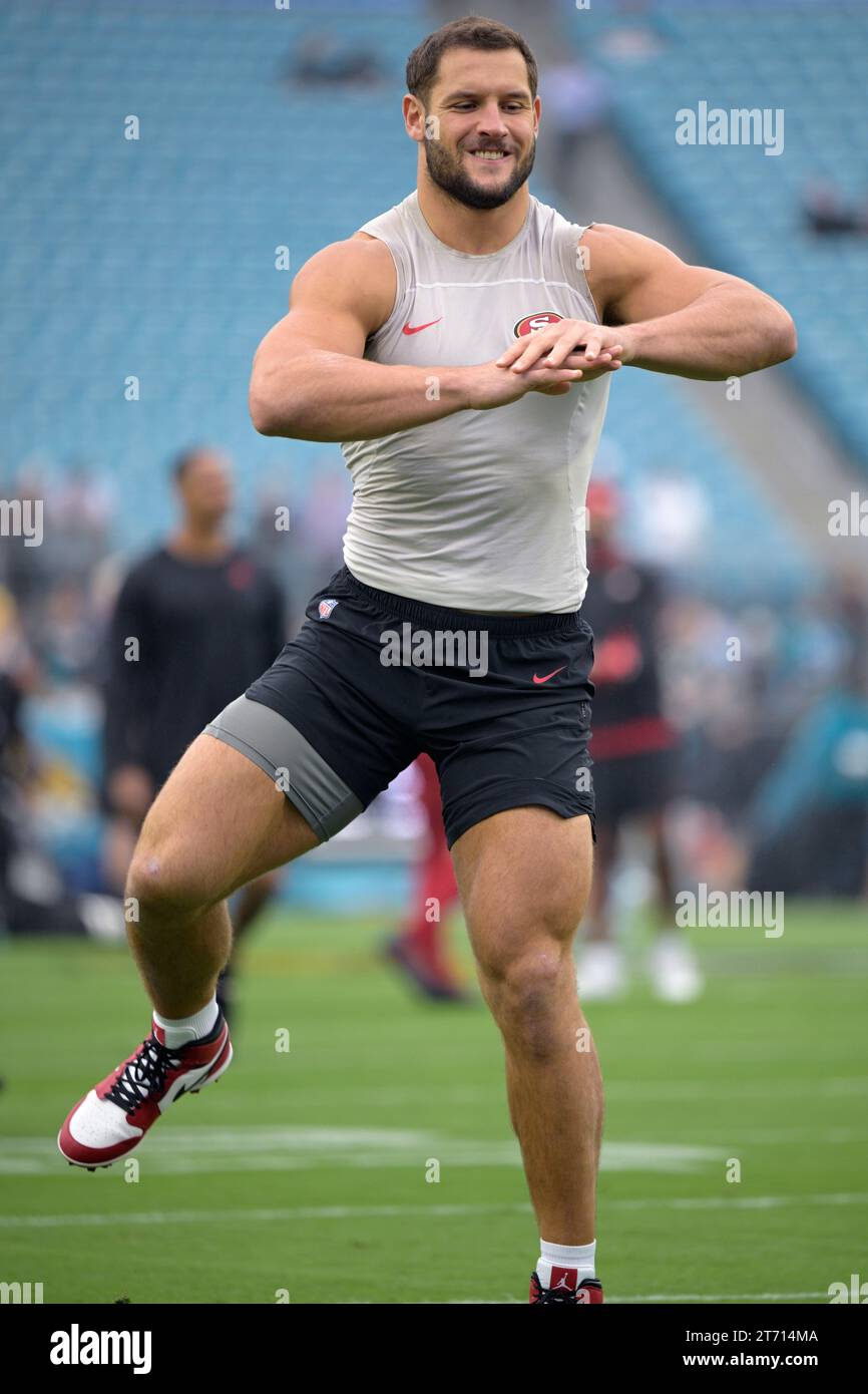 San Francisco 49ers defensive end Nick Bosa warms up before an NFL ...