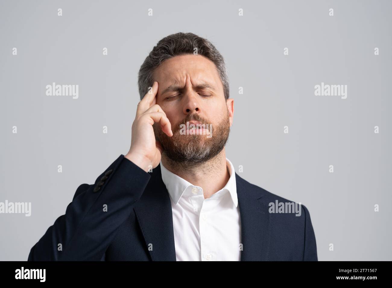 Businessman with stress and burnout. Business man got migraine touch ...