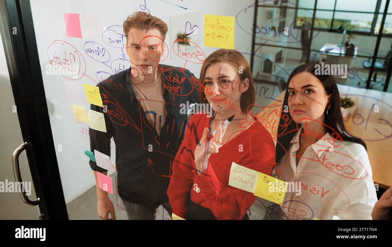 Young creative start up business team brainstorming idea and solving ...