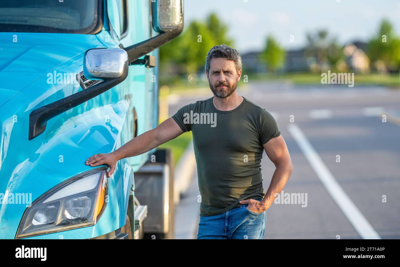 man driver near lorry truck. Truck driver. Trucking owner ...
