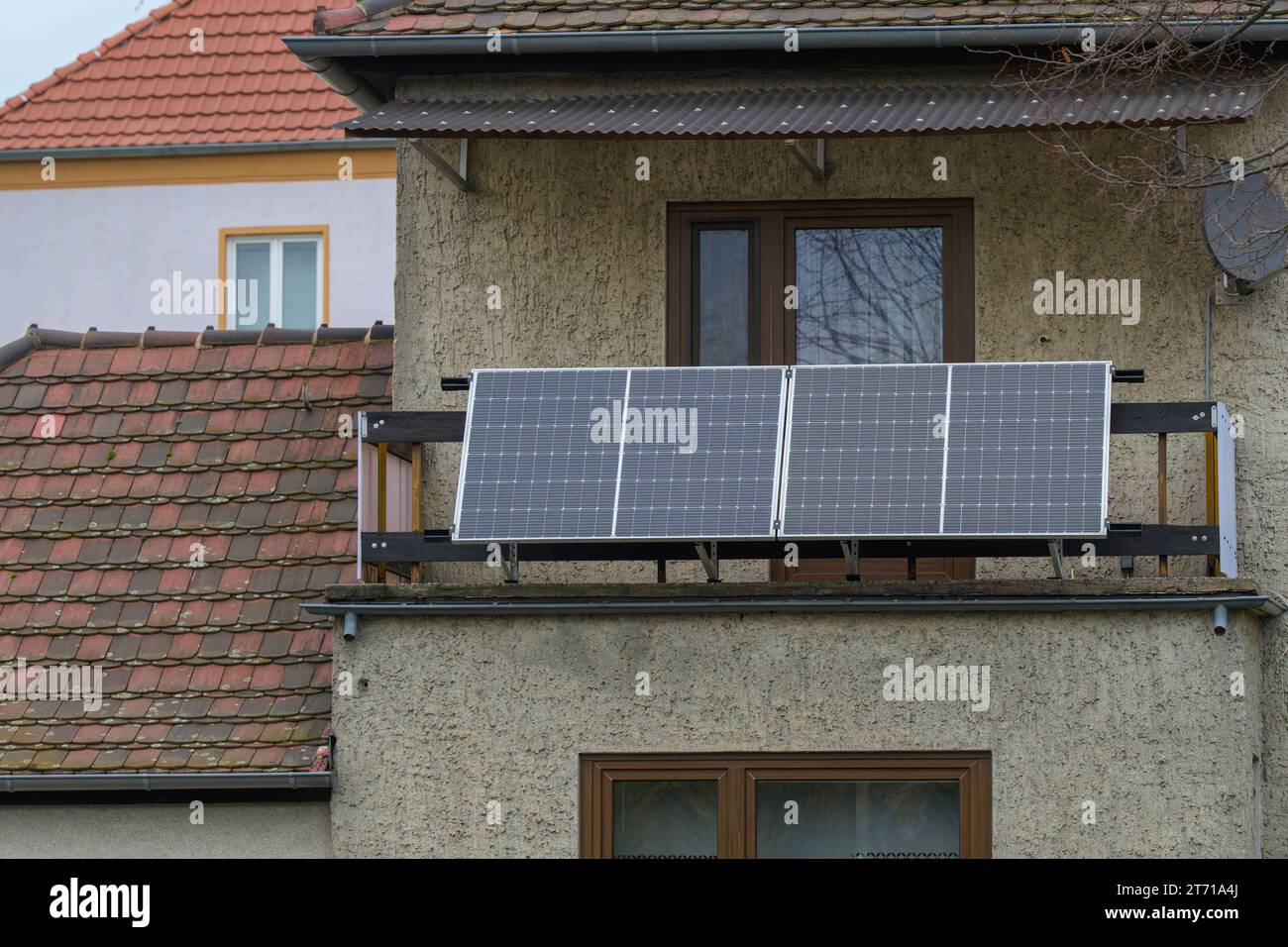 A balcony power station attached to the railing of the balcony Stock ...