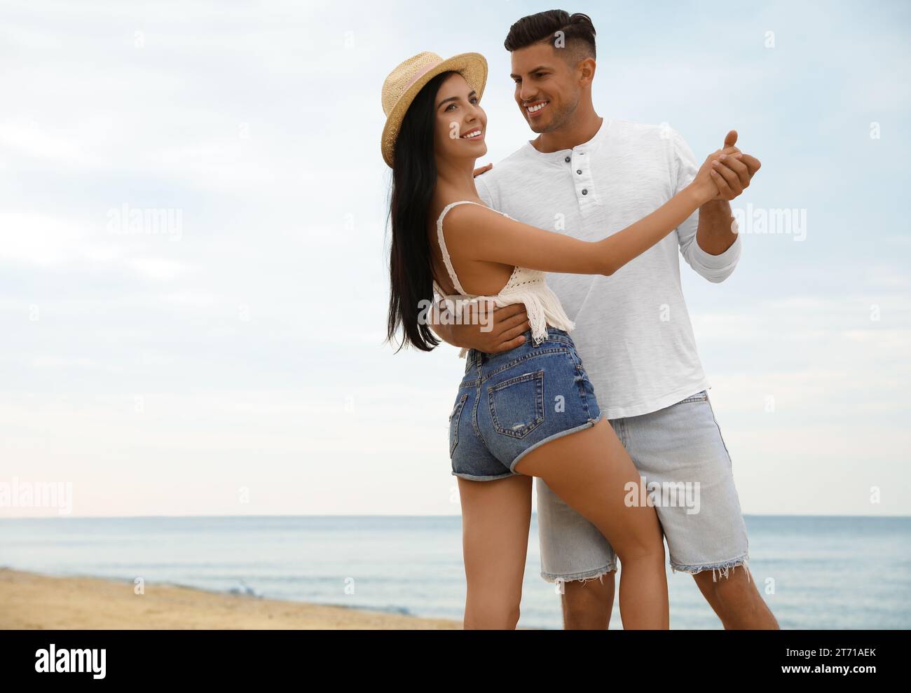 Woman dancing near ocean waves hi-res stock photography and images - Alamy