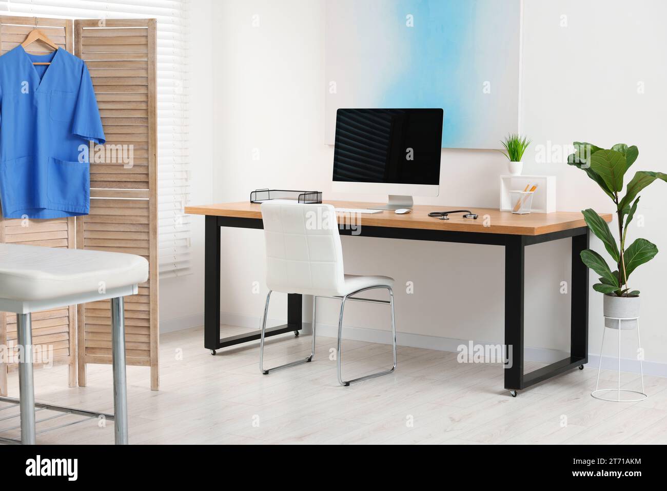 Modern medical office with doctor's workplace in clinic Stock Photo - Alamy
