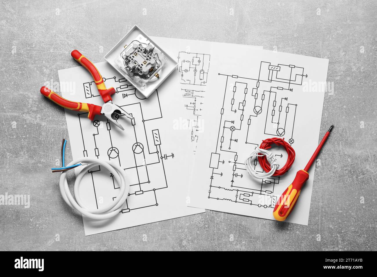 Wiring diagrams, wires and tools on grey table, flat lay Stock Photo ...