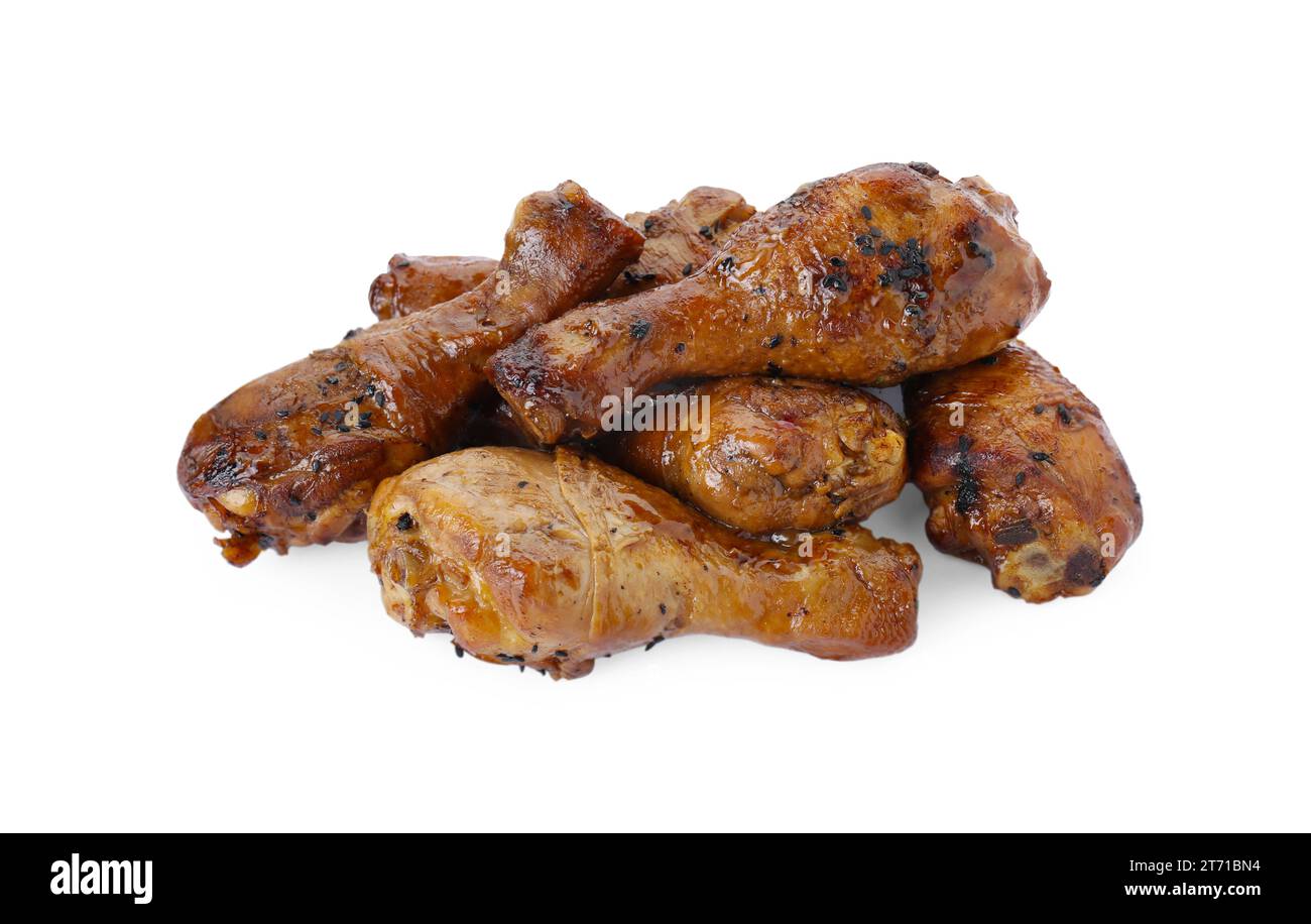 Pile of chicken legs glazed with soy sauce isolated on white Stock ...