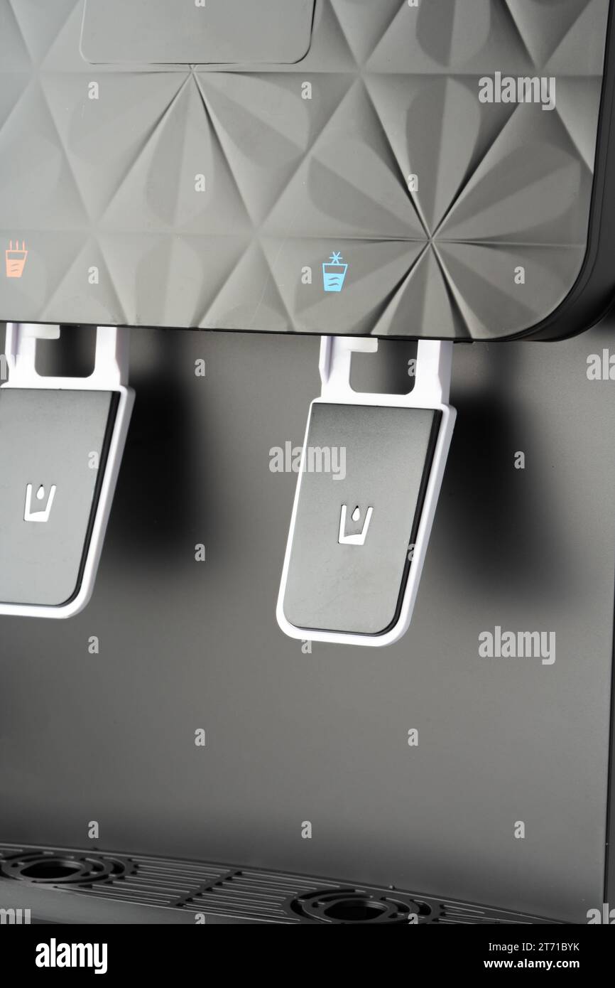 Water button in the cooler close up Stock Photo - Alamy