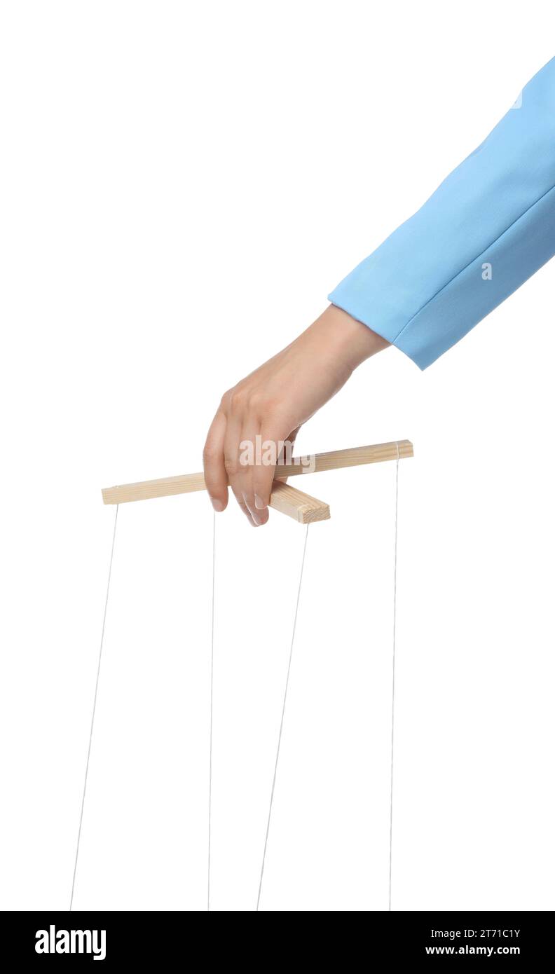 Woman pulling strings of puppet on white background, closeup Stock ...