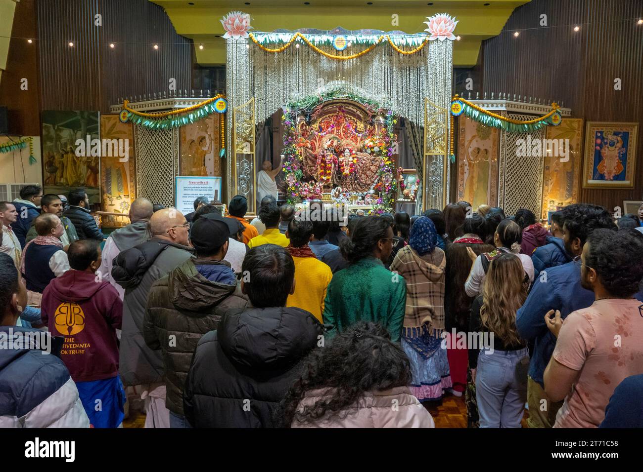 NEW YORK, NEW YORK - NOVEMBER 12: Hindu devotees sing and clap hands ...