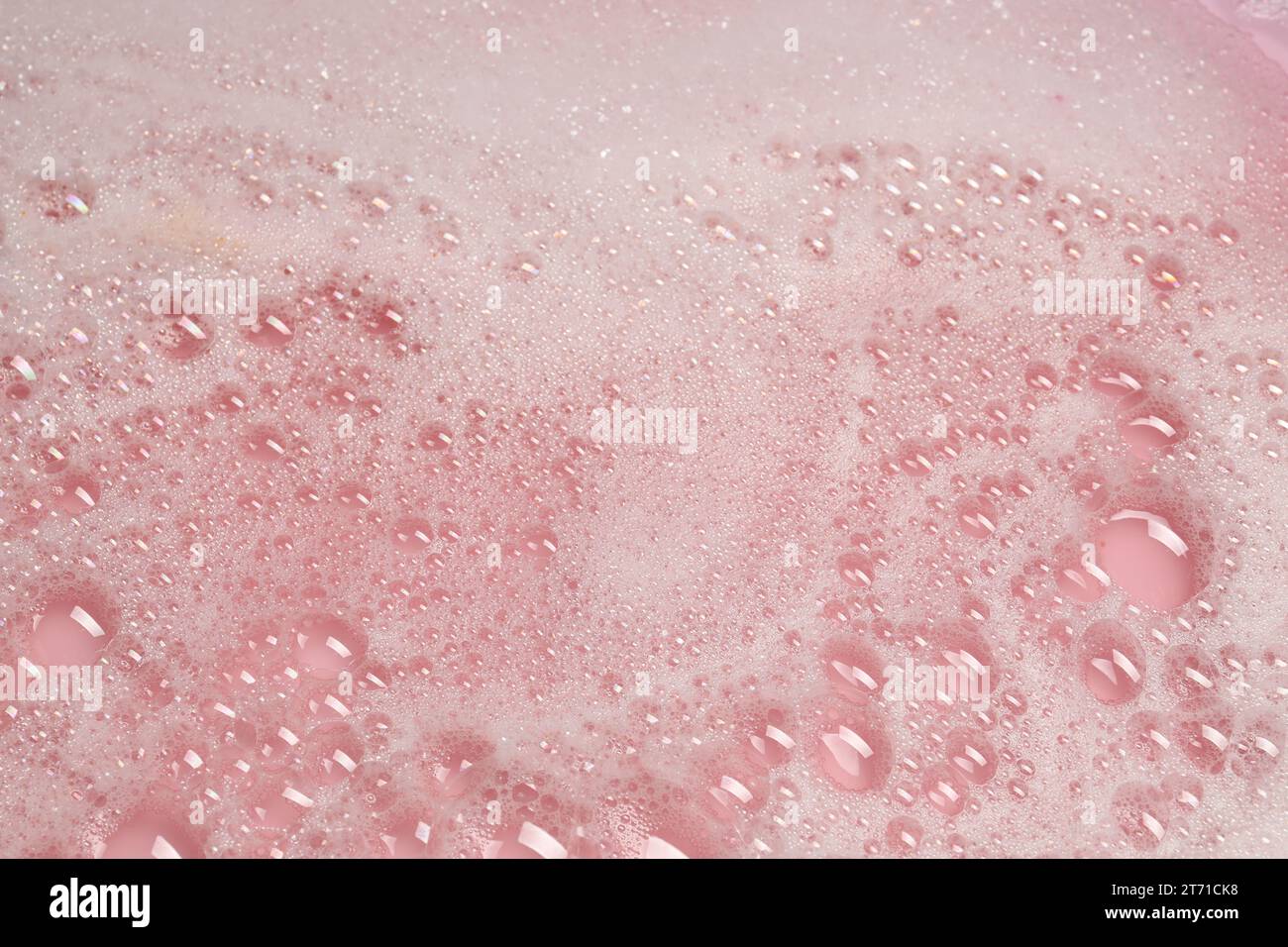 Colorful foam after dissolving bath bomb in water, closeup Stock Photo ...