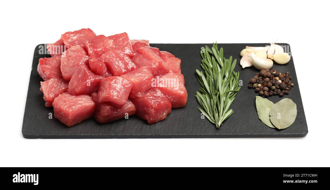 Pieces of raw beef, bay leaves, garlic, rosemary and peppercorns ...