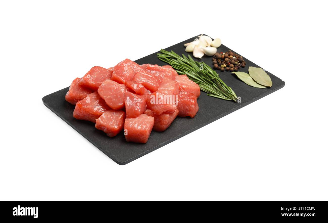 Pieces of raw beef, bay leaves, garlic, rosemary and peppercorns ...