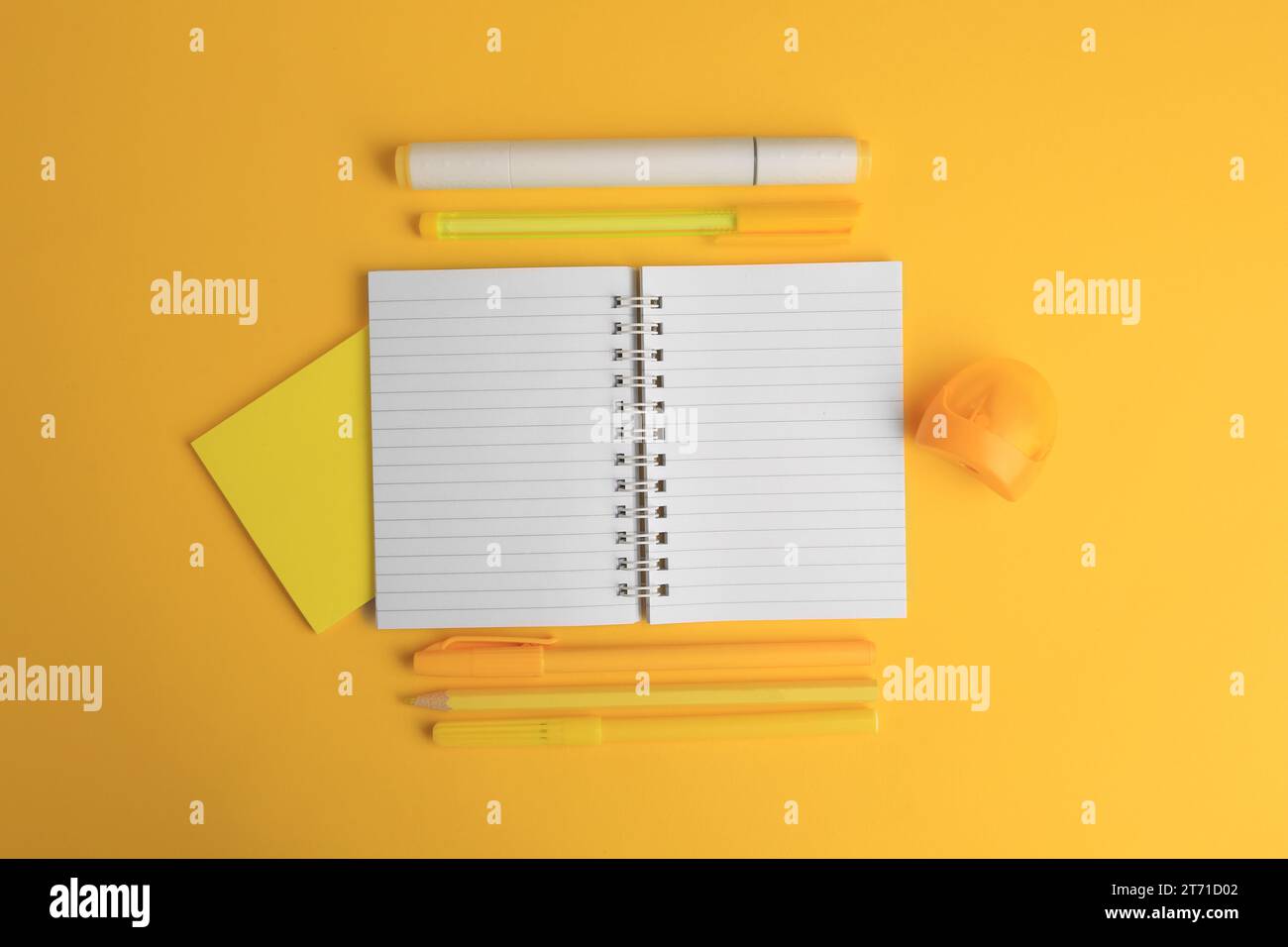 Flat lay composition with open notebook and different school stationery ...