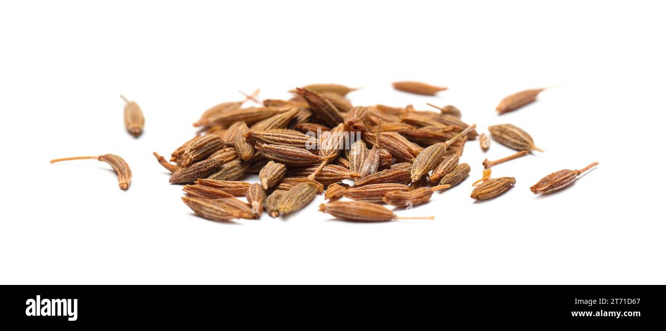 Heap of aromatic caraway (Persian cumin) seeds isolated on white Stock ...