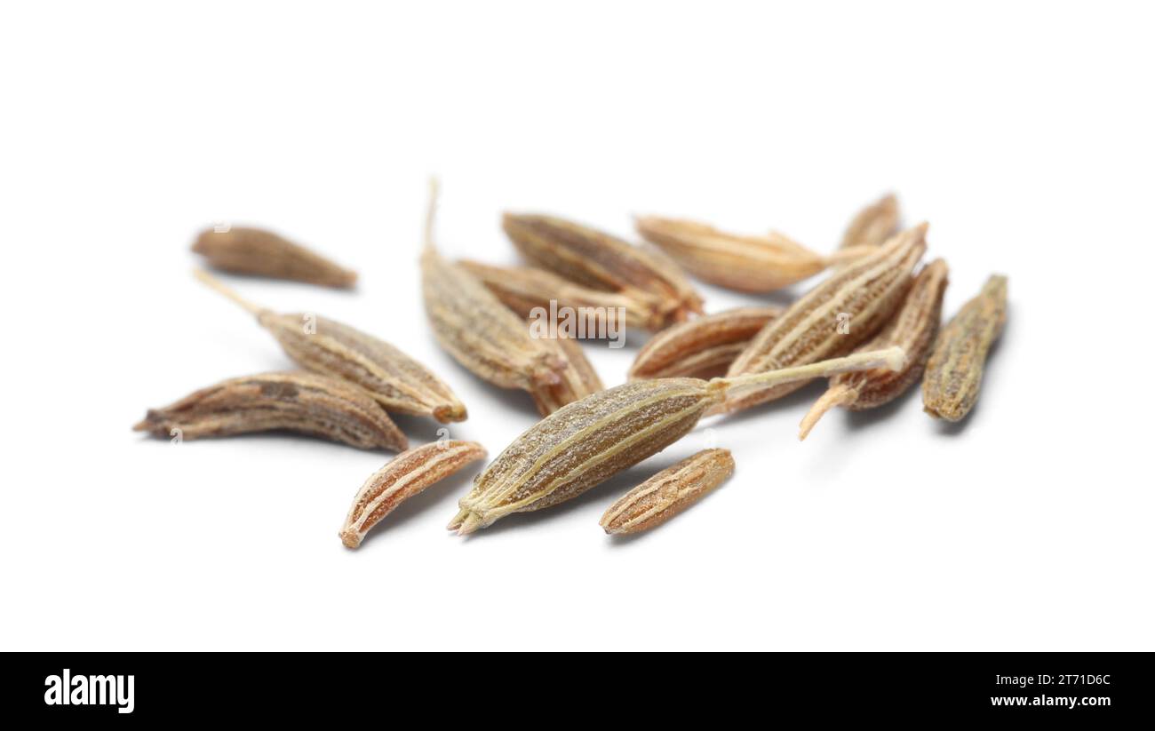 Heap of aromatic caraway (Persian cumin) seeds isolated on white Stock ...