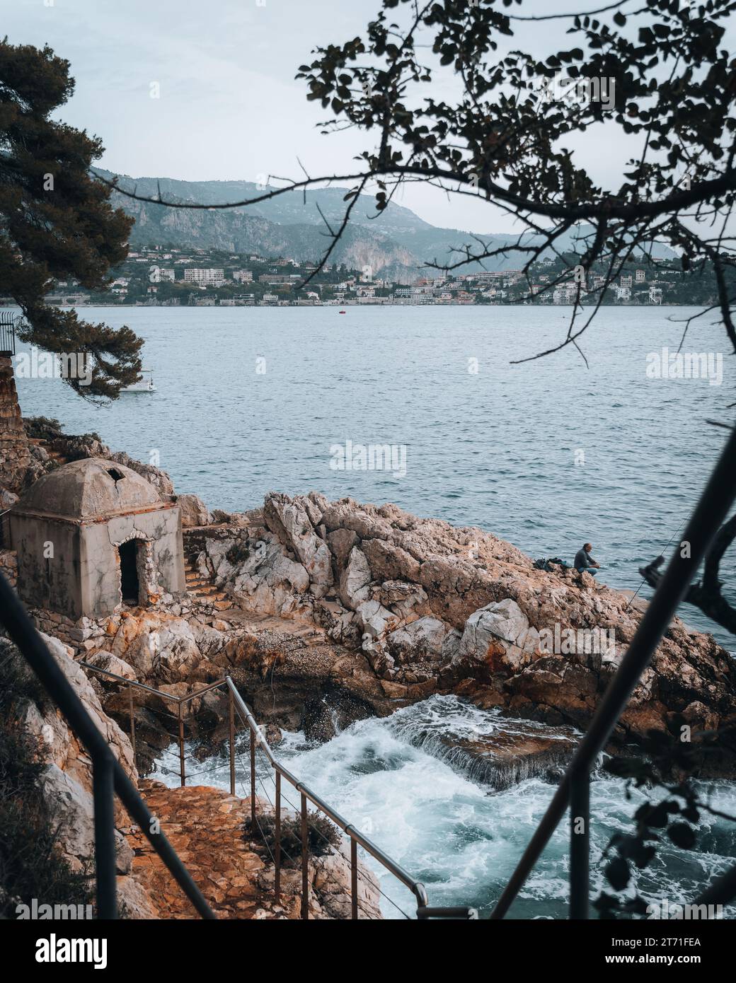 A picturesque building atop a dramatic cliff face in Nice, France Stock ...