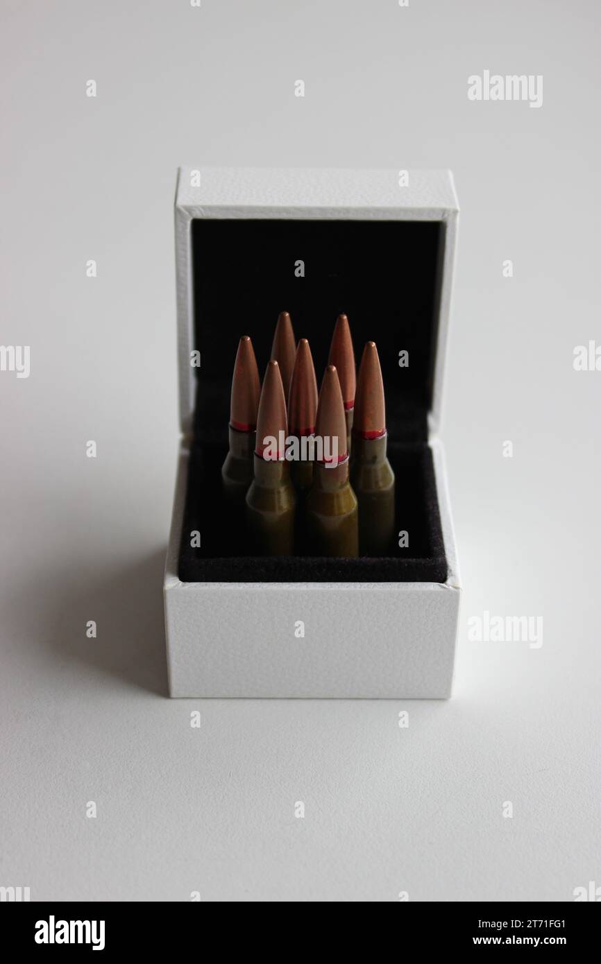 Concept Photo Of Bullets In White Jewelry Box On White Background Stock ...