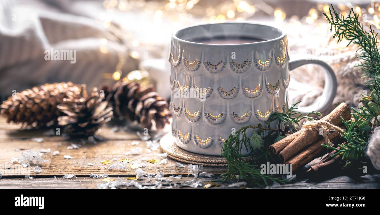 Coffee cup at home on a wooden table with bumps on a background with ...