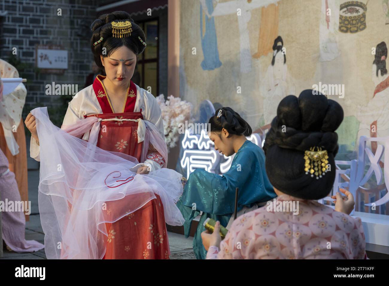 People perform in ancient costumes in Xiangyang City, central China's Hubei Province, 10 ...