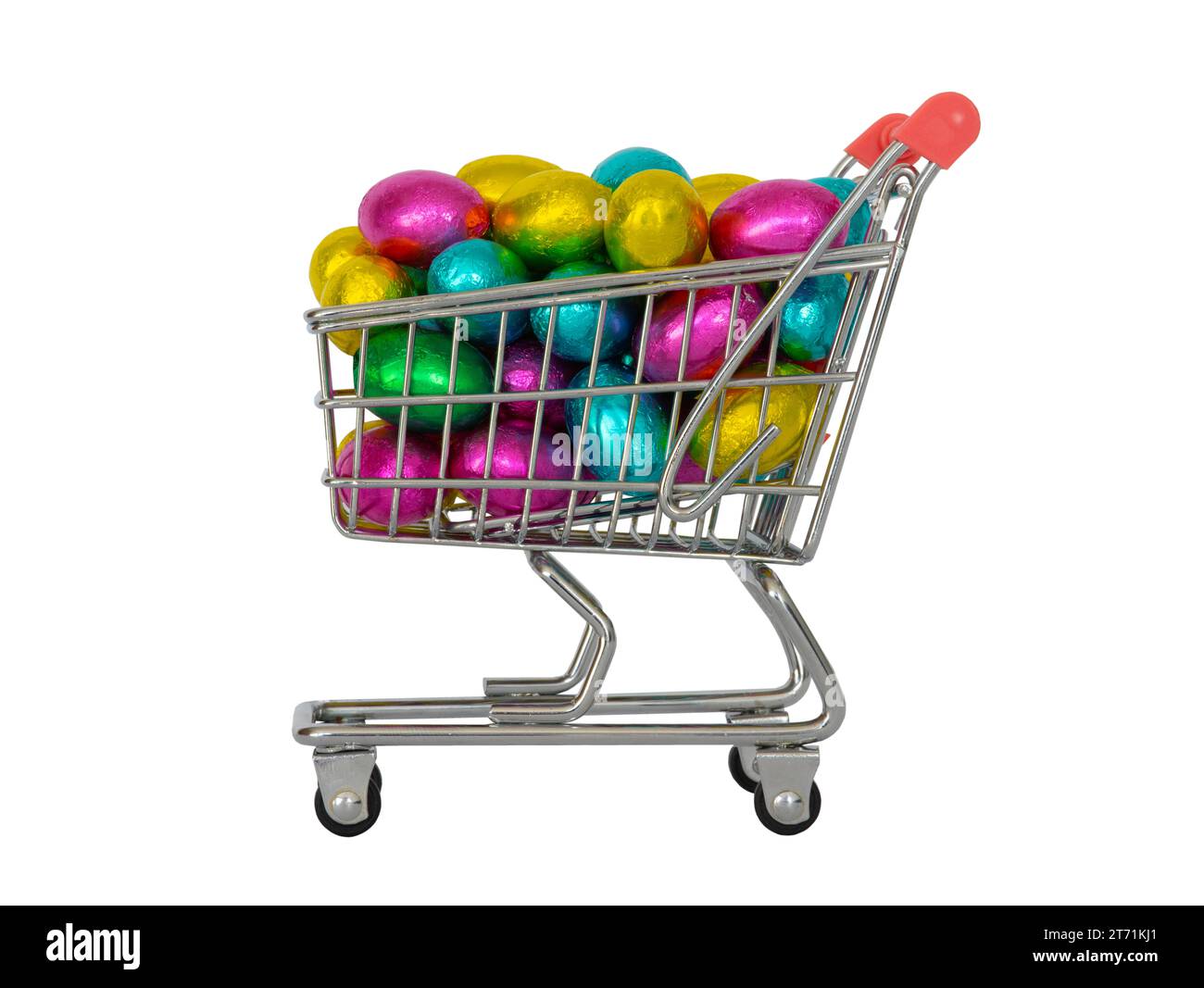 shopping trolley filled with multi-colored chocolates in the form of ...