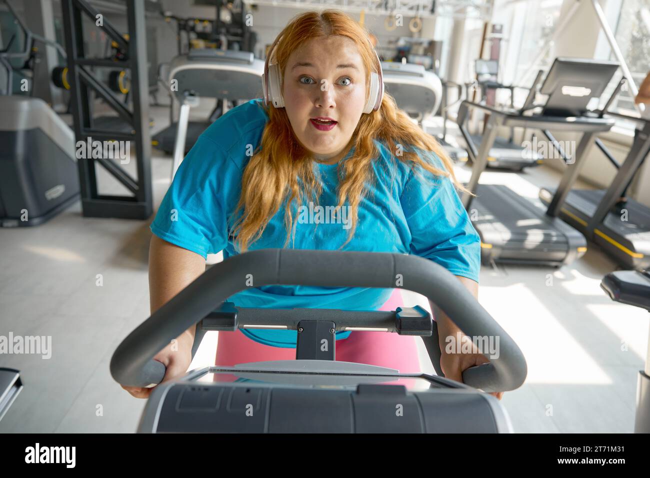Overweight woman riding bike hi-res stock photography and images - Alamy