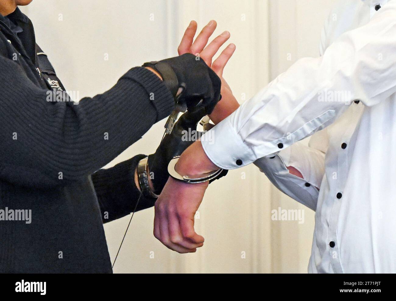 Karlsruhe, Germany. 13th Nov, 2023. The defendant in a murder trial has ...