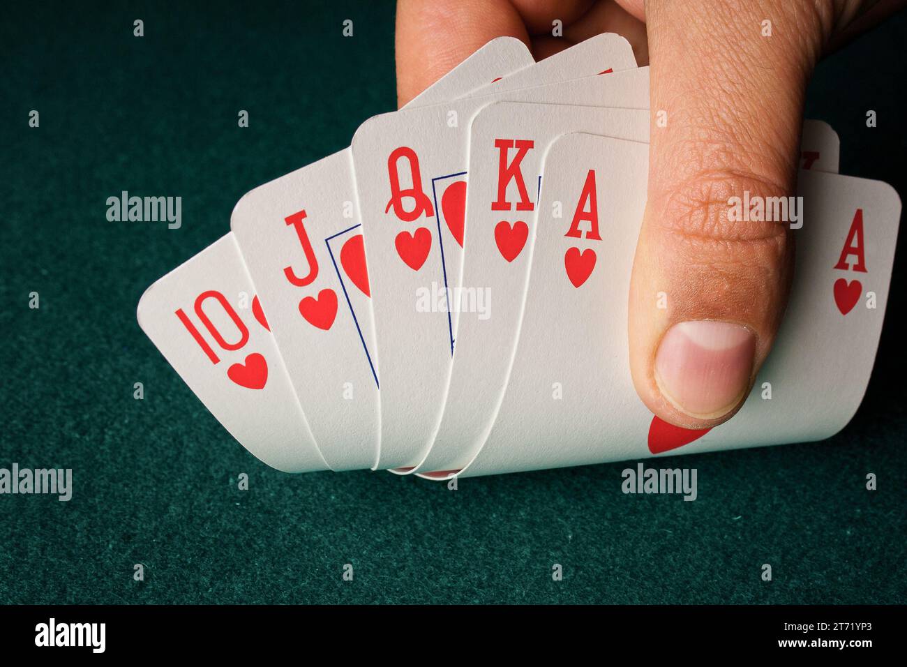 detail of a royal flush on green table Stock Photo - Alamy